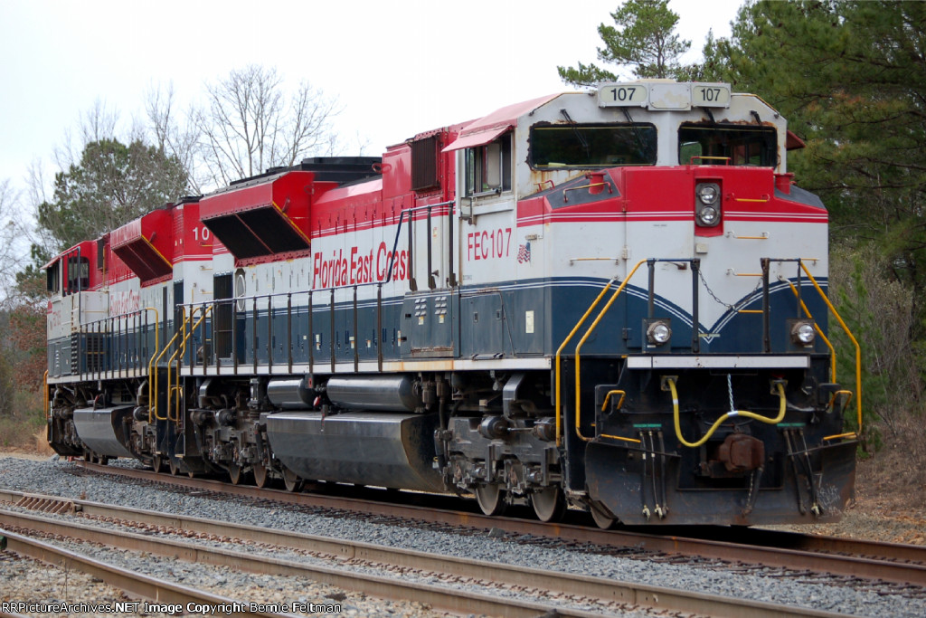 Florida East Coast SD70M-2's 107 & 105 tied down on the Martin-Marietta Engine Track awaiting ...